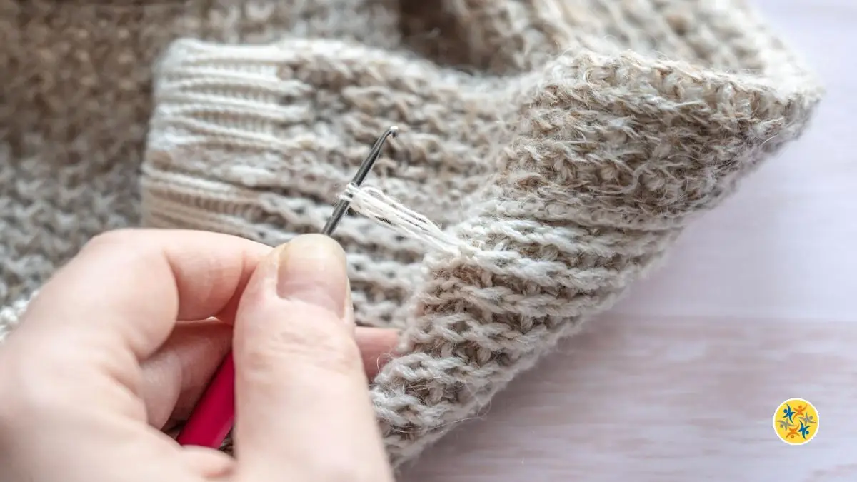 Comment je Répare un Accroc sur mon Pull d'Hiver